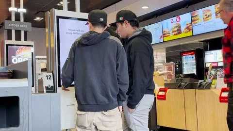McDonalds - Interior - Two Men Ordering ... | Stock Video | Pond5