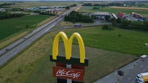 McDonalds restaurant logo near highway, ... | Stock Video | Pond5