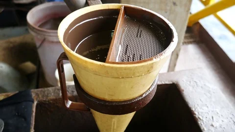 Measure mud viscosity with Marsh funnel ... | Stock Video | Pond5
