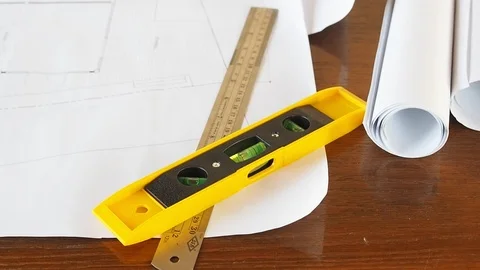 Measurement tool with blueprint, archite... | Stock Video | Pond5