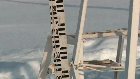 measuring snow depth with a close-up rul... | Stock Video | Pond5