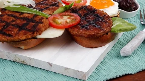 meat food big beef hamburger fried eggs ... | Stock Video | Pond5