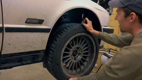 Mechanic doing inspection and service on... | Stock Video | Pond5