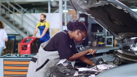 Mechanic in garage using torque wrench | Stock Video | Pond5