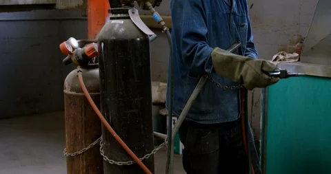 Mechanic lighting wielding torch 4k | Stock Video | Pond5