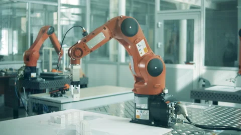 Mechanical arm is working with small obj... | Stock Video | Pond5