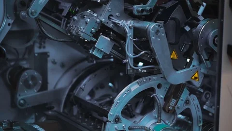 Mechanism at the factory. Gear system ro... | Stock Video | Pond5