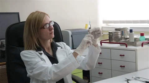 Medical Doctor or Nurse Loading Syringe ... | Stock Video | Pond5