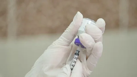 Medical doctor or nurse loading syringe ... | Stock Video | Pond5