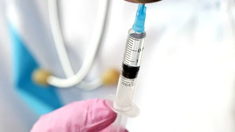 Medical doctor picking up medication int... | Stock Video | Pond5