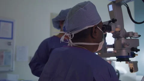 Medical Professional Using Surgical Micr... | Stock Video | Pond5