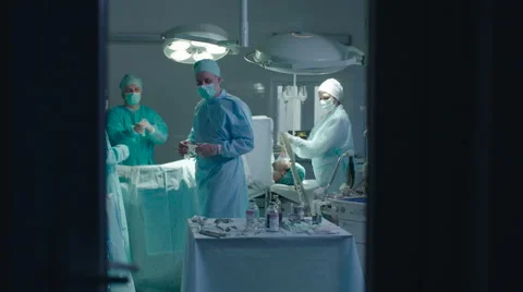 Medical Staff Leaving Operating Room aft... | Stock Video | Pond5