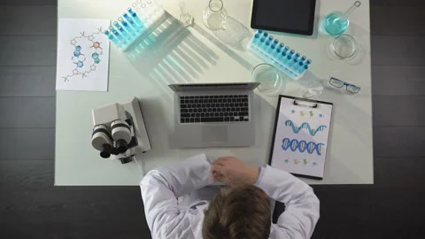 Medical student studying DNA image, maki... | Stock Video | Pond5