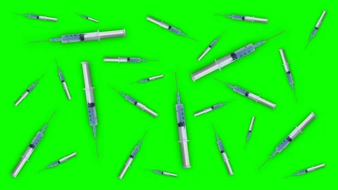 Medical syringes on the green screen | Stock Video | Pond5