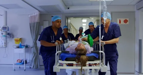 Medical teams pushing emergency bed 4k | Stock Video | Pond5