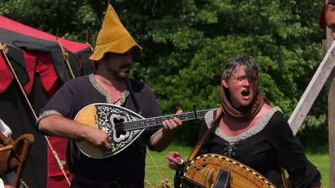 medieval band and female singer on hurdy... | Stock Video | Pond5