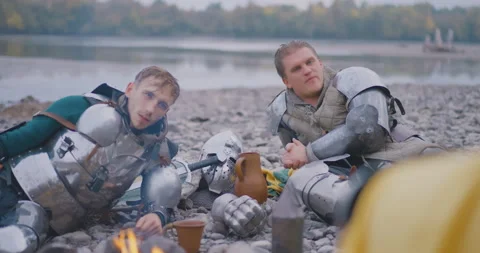 Medieval camp Knights by the campfire Me... | Stock Video | Pond5