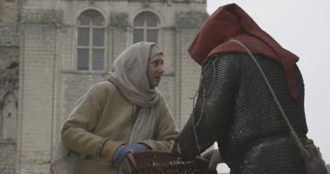 Medieval castle guard is approached by f... | Stock Video | Pond5