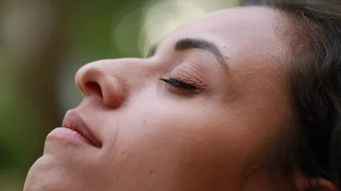 Meditative young woman face opening eyes... | Stock Video | Pond5