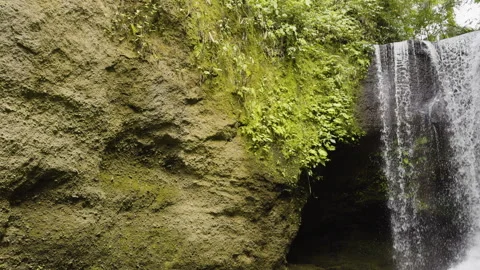 Medium Pan Right of Suwat Waterfall Amid... | Stock Video | Pond5