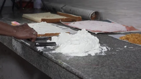Medium shot side view of hands rolling a... | Stock Video | Pond5
