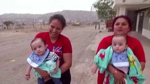 Meet Peru's latest conjoined twins to be... | Stock Video | Pond5