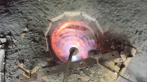 Melted piles of iron ingots in a furnace | Stock Video | Pond5