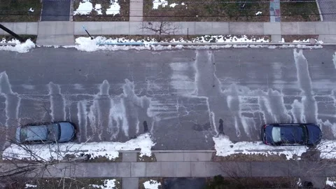 Melted salt stain pattern on winter asph... | Stock Video | Pond5