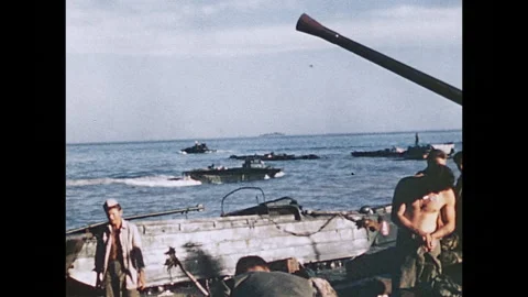 Men and 40mm gun on beach LVT Water Buff... | Stock Video | Pond5