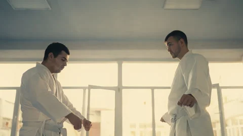 Men doing greeting in taekwondo, bowing ... | Stock Video | Pond5