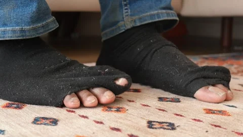 men feet with dirty socks while sitting ... | Stock Video | Pond5