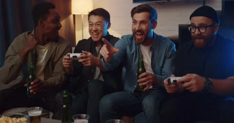 Men friends having fun playing video gam... | Stock Video | Pond5