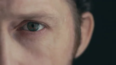 Men's eyes. stares intently at the camer... | Stock Video | Pond5