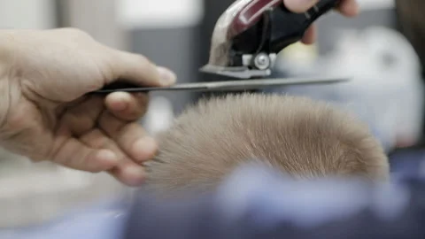 Men's haircut in Barbershop. Close-up ma... | Stock Video | Pond5