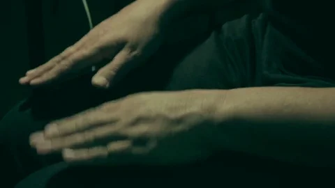 Men's hands tapping hands on the knee | Stock Video | Pond5