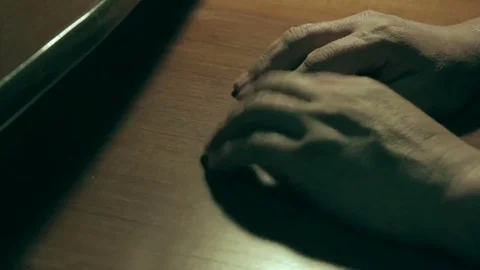 Men's hands tapping hands on the table | Stock Video | Pond5