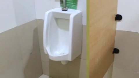 Men Urinal Stock Videos – Royalty-Free HD & 4K Videos
