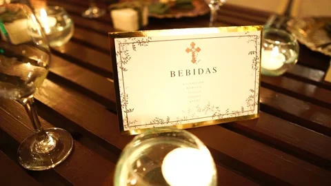 Menu card on the table lit with candle l... | Stock Video | Pond5