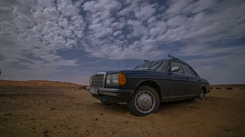 Mercedes Benz in the Moroccan desert wit... | Stock Video | Pond5