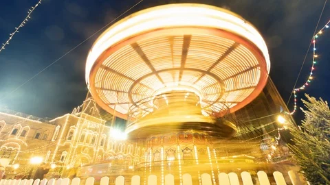 Merry-go-round carousel at night. Amusem... | Stock Video | Pond5