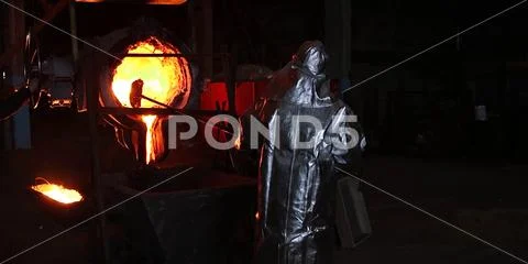 Photograph: Metal cast process in blast furnace in metallurgical #250525497