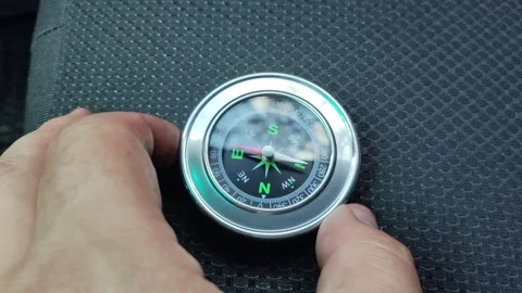metal compass in hand. silver antique co... | Stock Video | Pond5