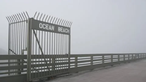 Metal gate of Ocean Beach pier in fog, m... | Stock Video | Pond5