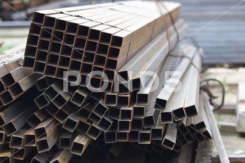 Metal profile pipe of rectangular cross section in packs at the ...