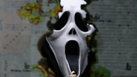 Metaphorical mask of horror with fire th... | Stock Video | Pond5