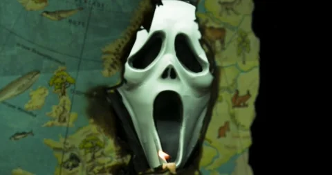 Metaphorical mask of horror with fire th... | Stock Video | Pond5