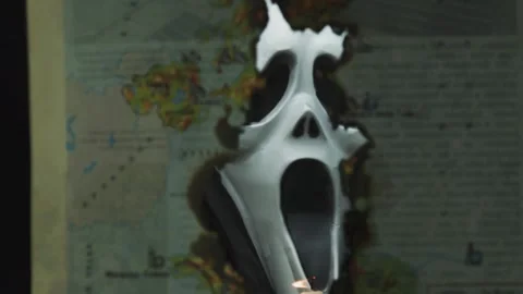 Metaphorical mask of horror with fire th... | Stock Video | Pond5