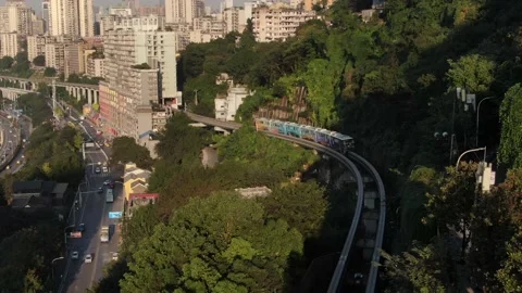 Metro Crosses A Residential Building in ... | Stock Video | Pond5