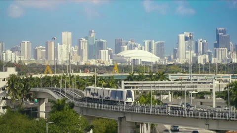 Metro train on elevated track with downt... | Stock Video | Pond5