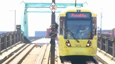Metrolink Tram off Bridge Ramp | Stock Video | Pond5